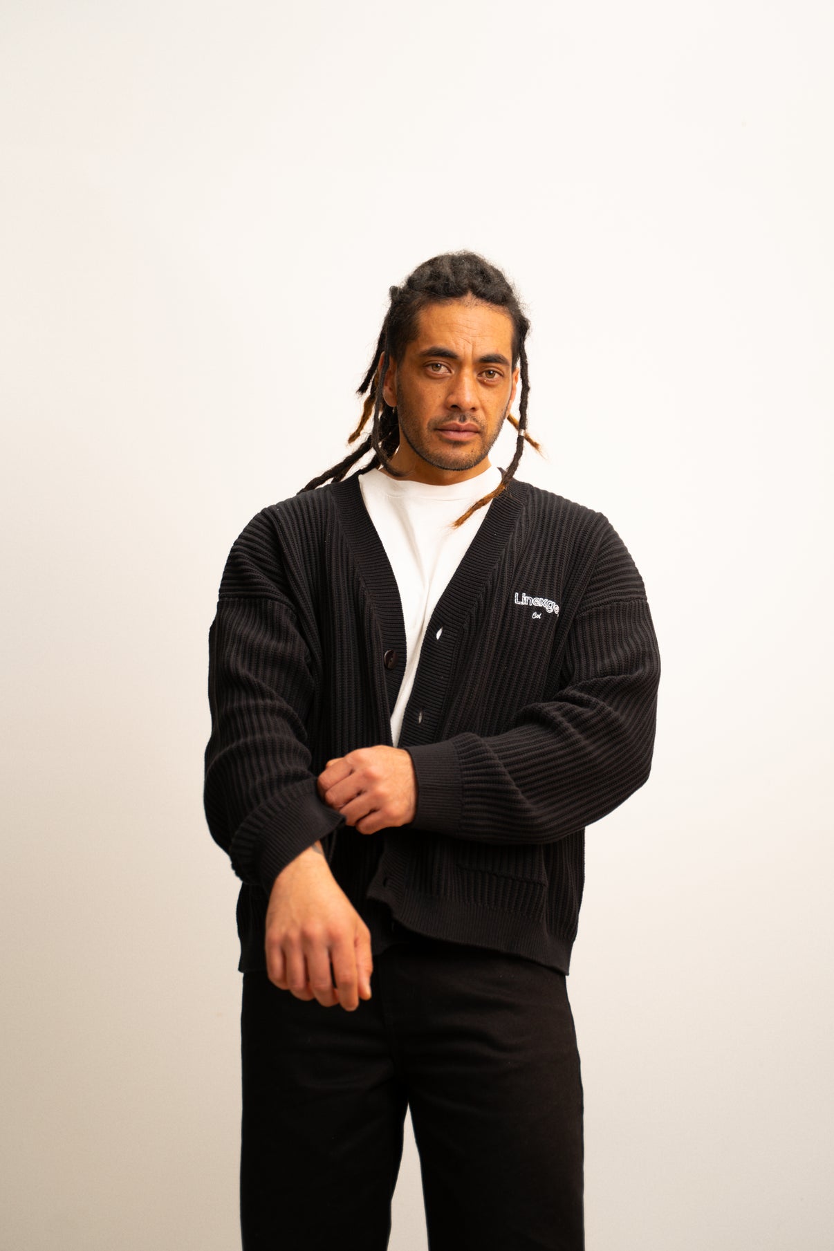 Te Kore - Black Cardigan – Lineage Collective.